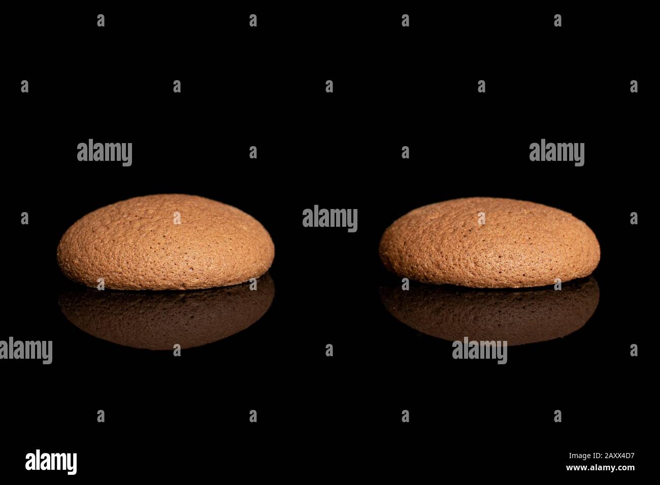 Group of two whole sweet brown chocolate sponge biscuit isolated on ...