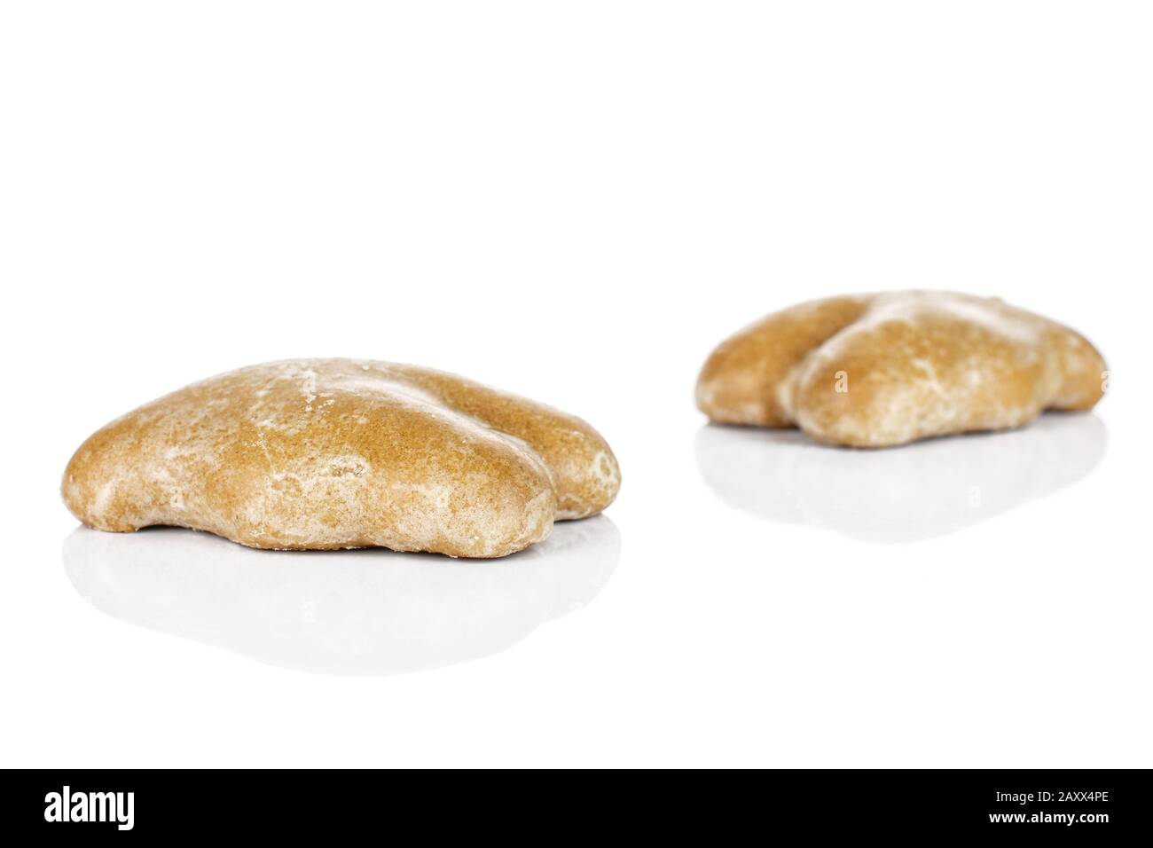Group of two whole sweet brown gingerbread isolated on white background ...