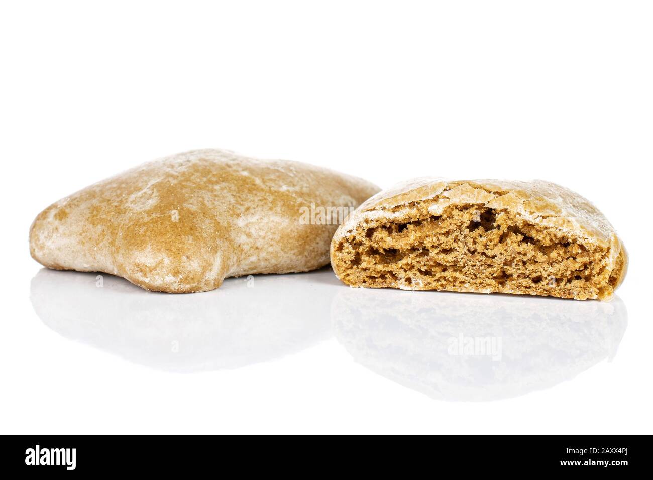 Group of one whole one half of sweet brown gingerbread isolated on ...