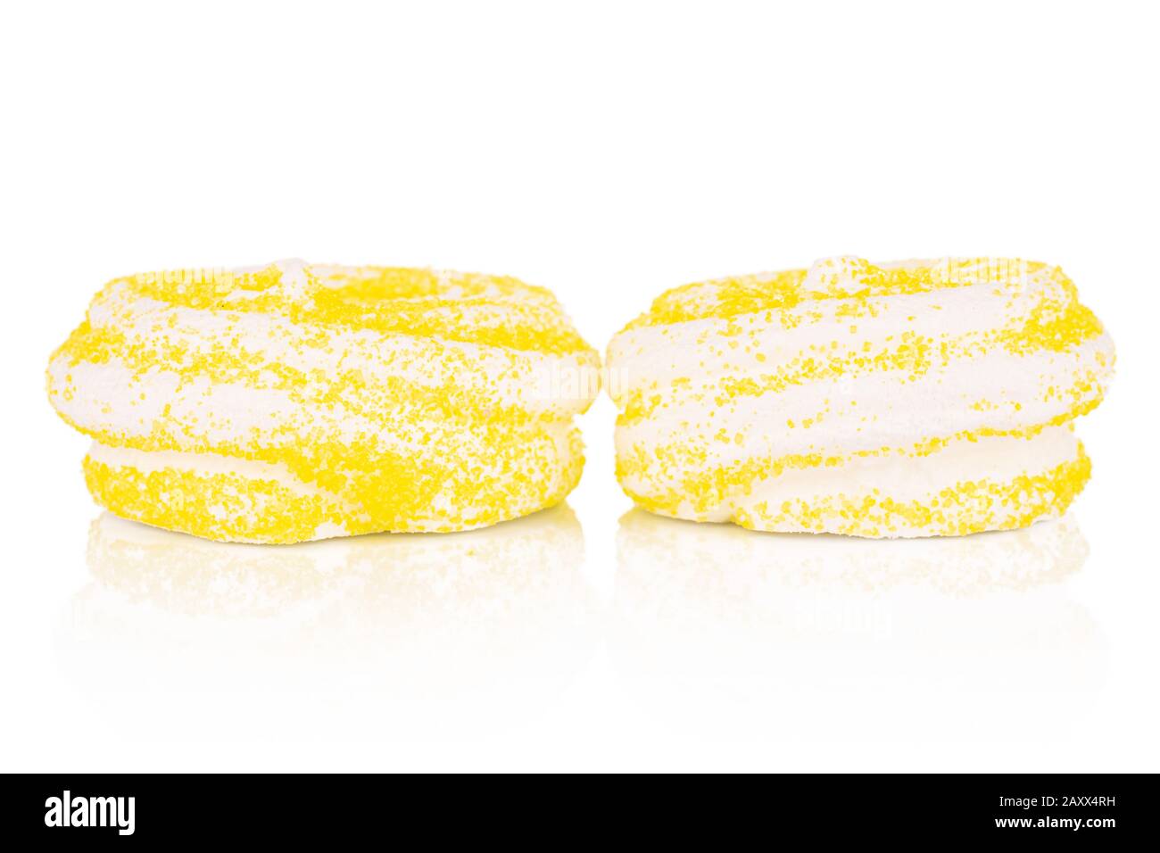 Group of two whole yellow sweet meringue isolated on white background ...