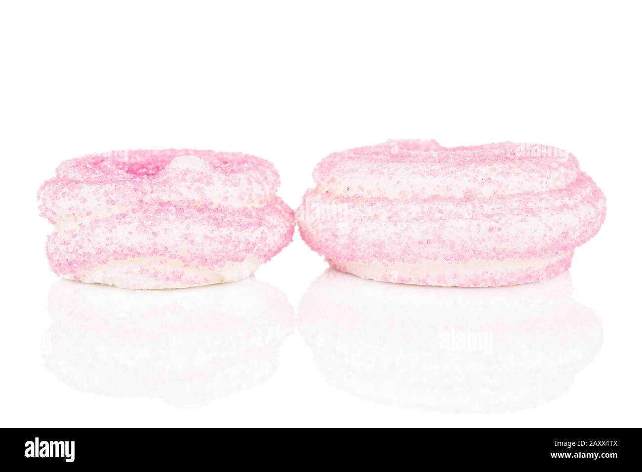 Group of two whole pink sweet meringue isolated on white background ...