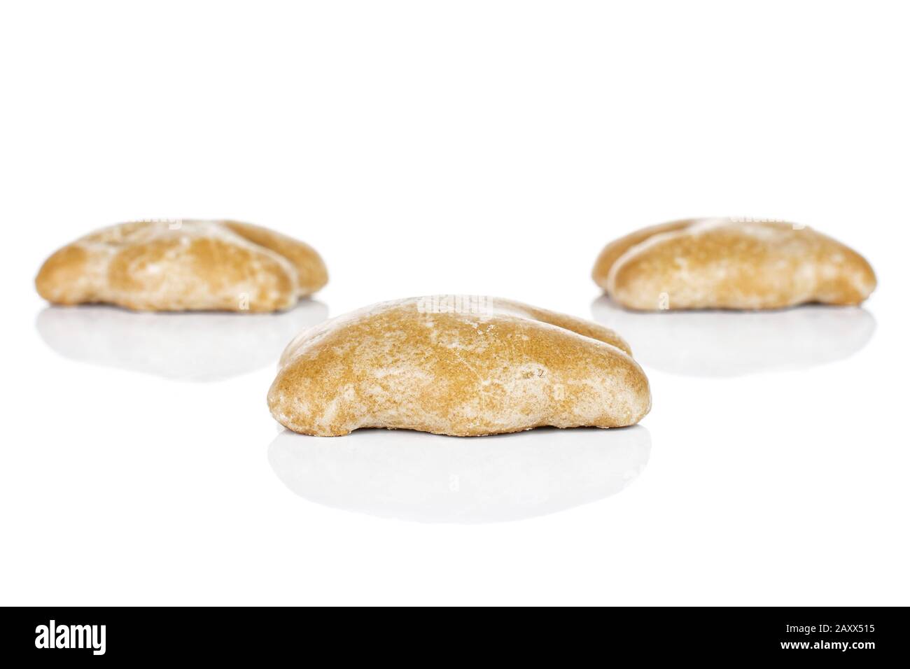Group of three whole sweet brown gingerbread isolated on white ...