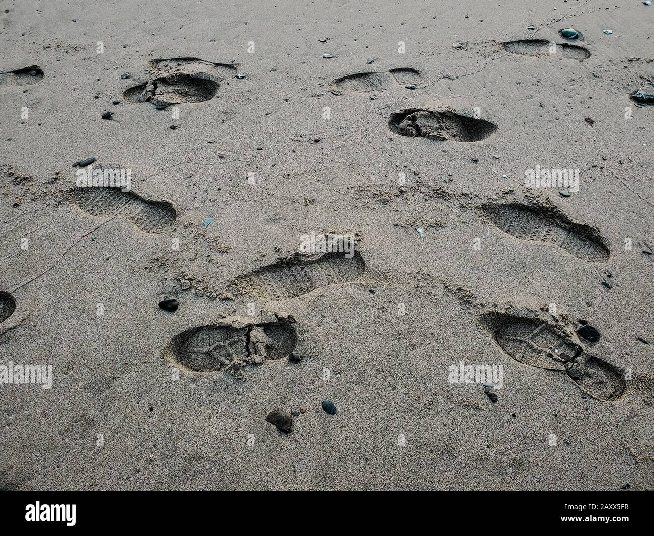 Human shoes steps footprints on wild sandy sea beach,texture wallpaper ...