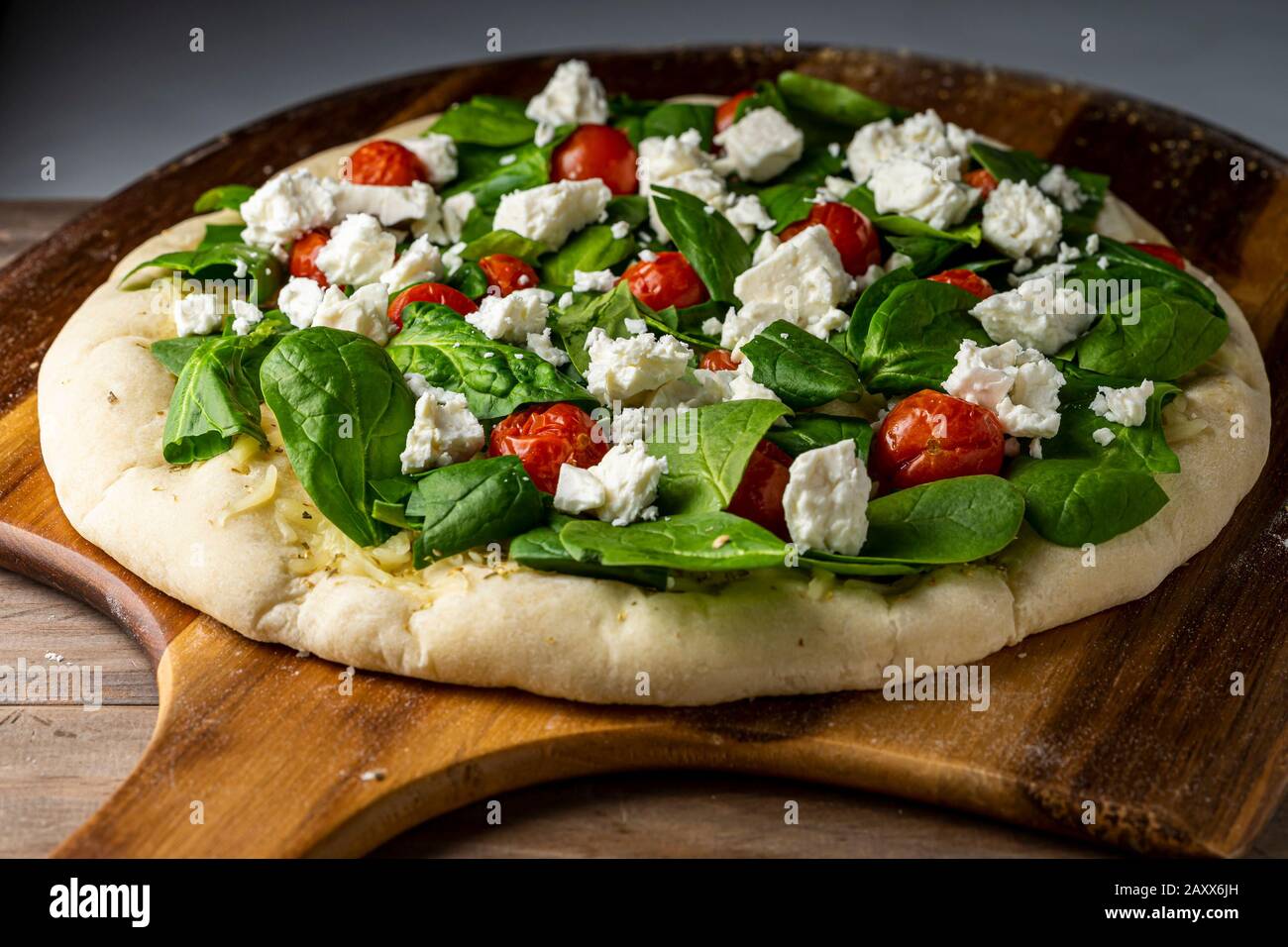 Uncooked cheese pizza hi-res stock photography and images - Alamy