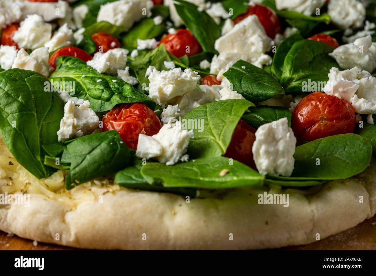 Uncooked cheese pizza hi-res stock photography and images - Alamy