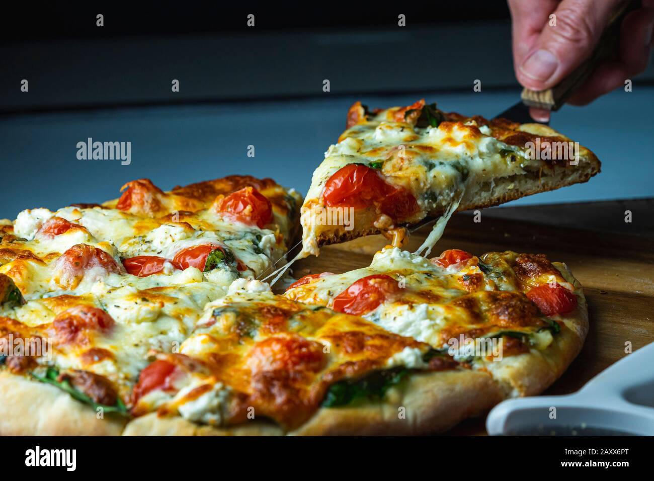 Pizza serving hi-res stock photography and images - Alamy