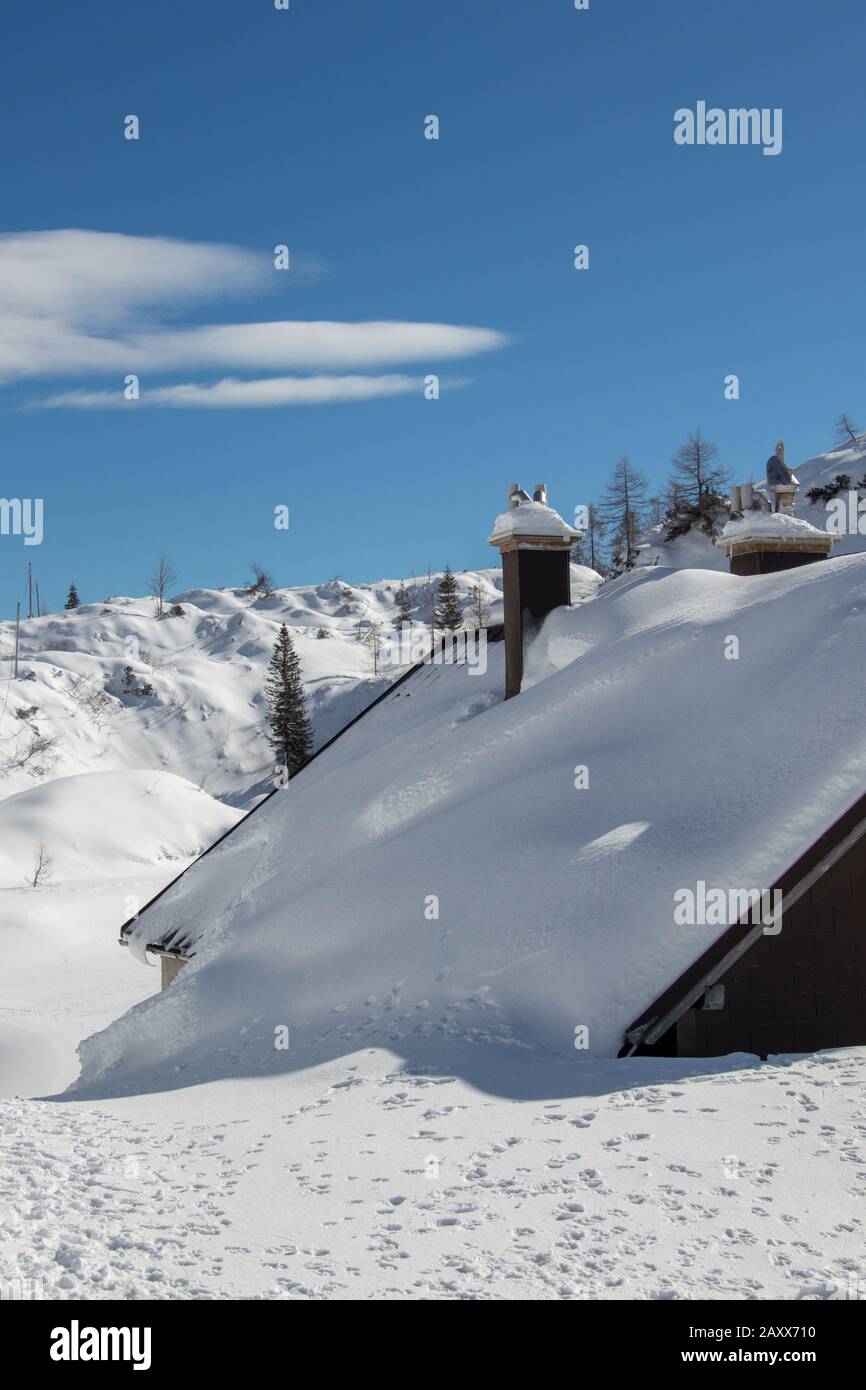 Mountain hut covered in snow, Komna plateau Stock Photo - Alamy