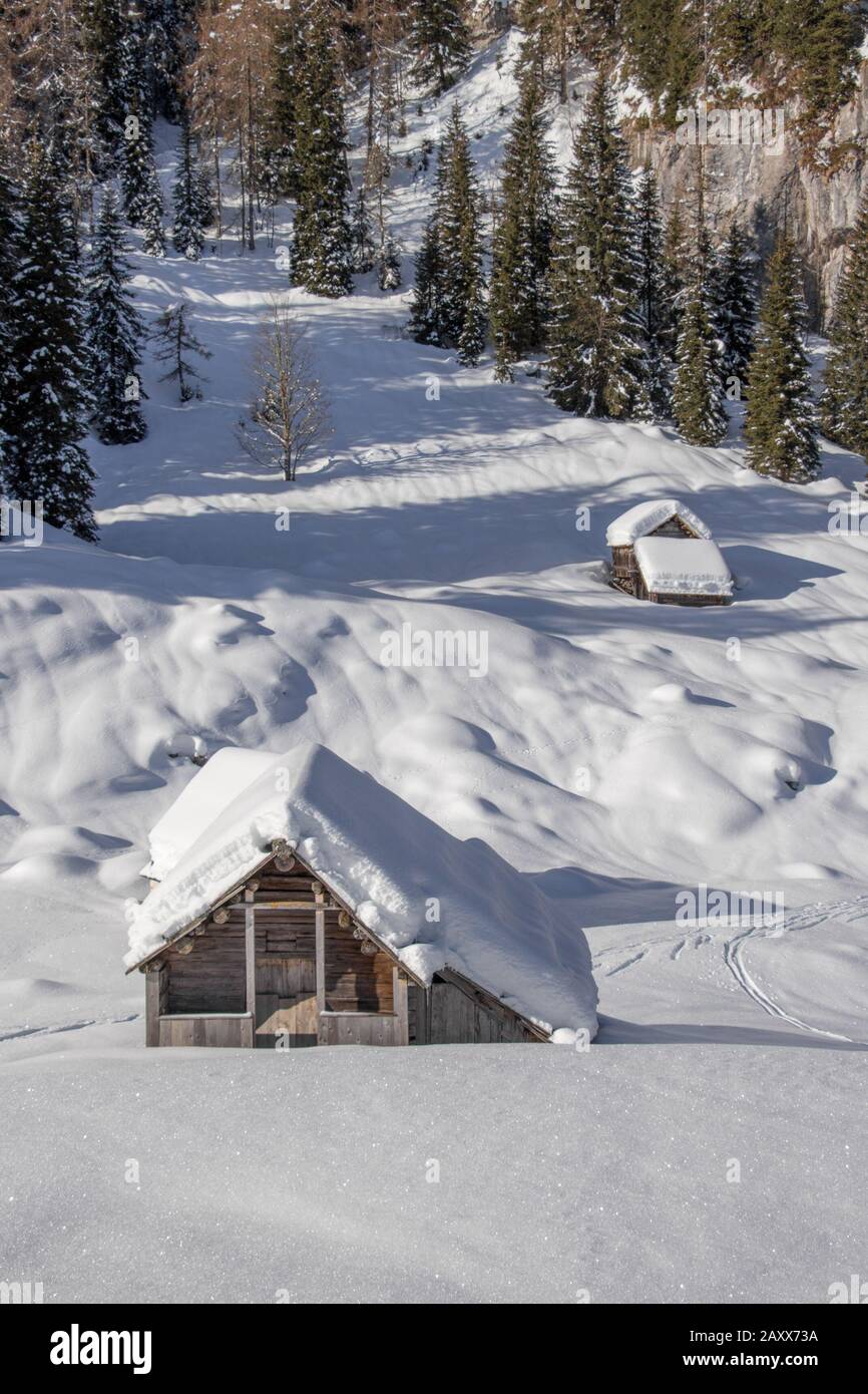 Mountain huts covered in snow Stock Photo - Alamy