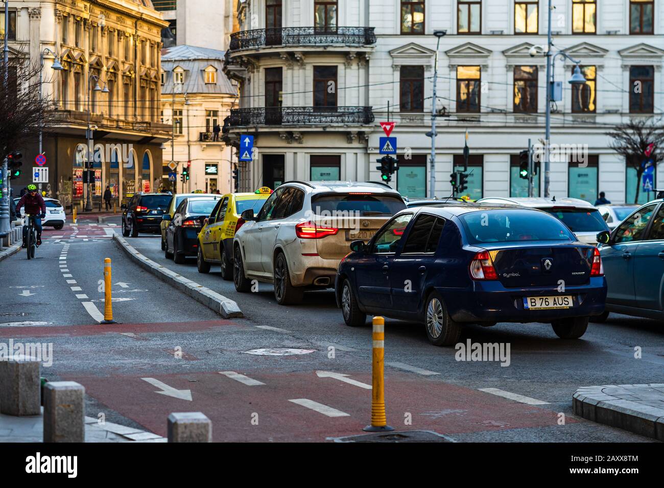 Car traffic at rush hour in downtown area of the city. Car pollution ...