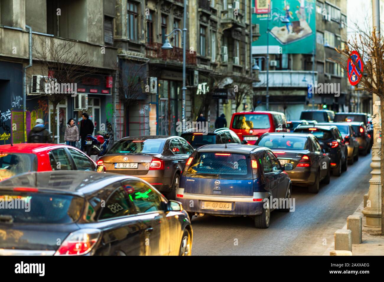 Car traffic at rush hour in downtown area of the city. Car pollution ...