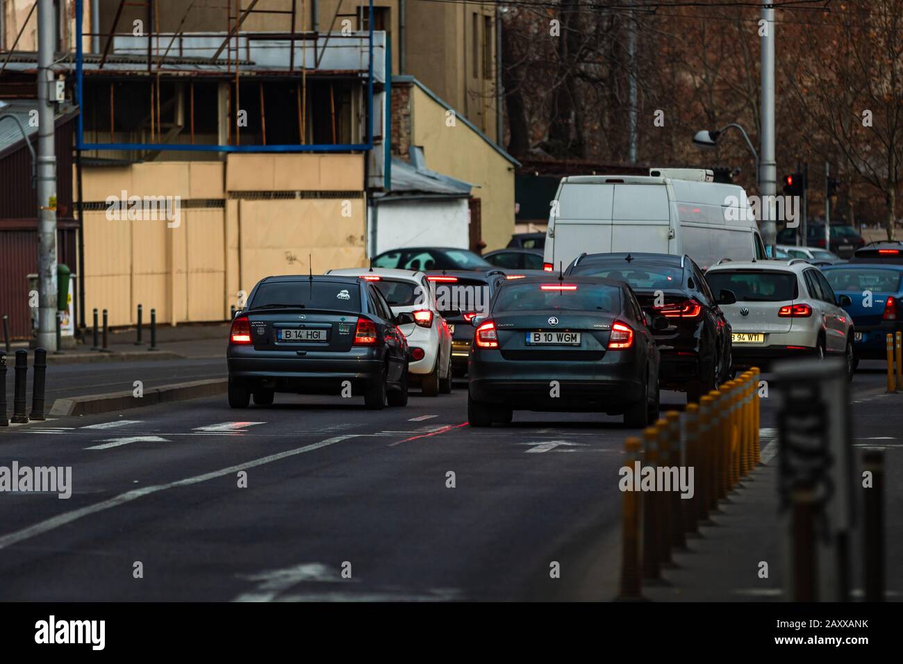 Car traffic at rush hour in downtown area of the city. Car pollution ...