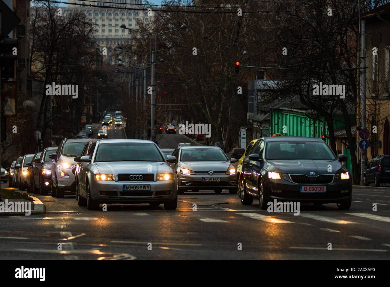 Car traffic at rush hour in downtown area of the city. Car pollution ...