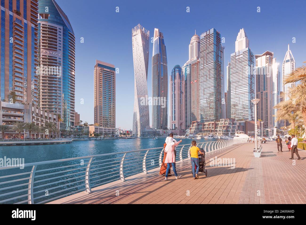 Dubai canal people walking hi-res stock photography and images - Alamy
