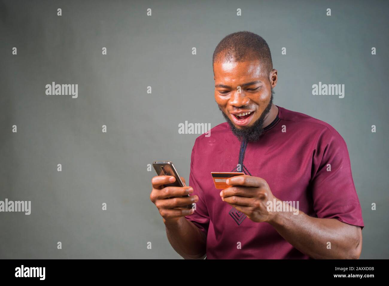 African guy making transaction hi-res stock photography and images - Alamy