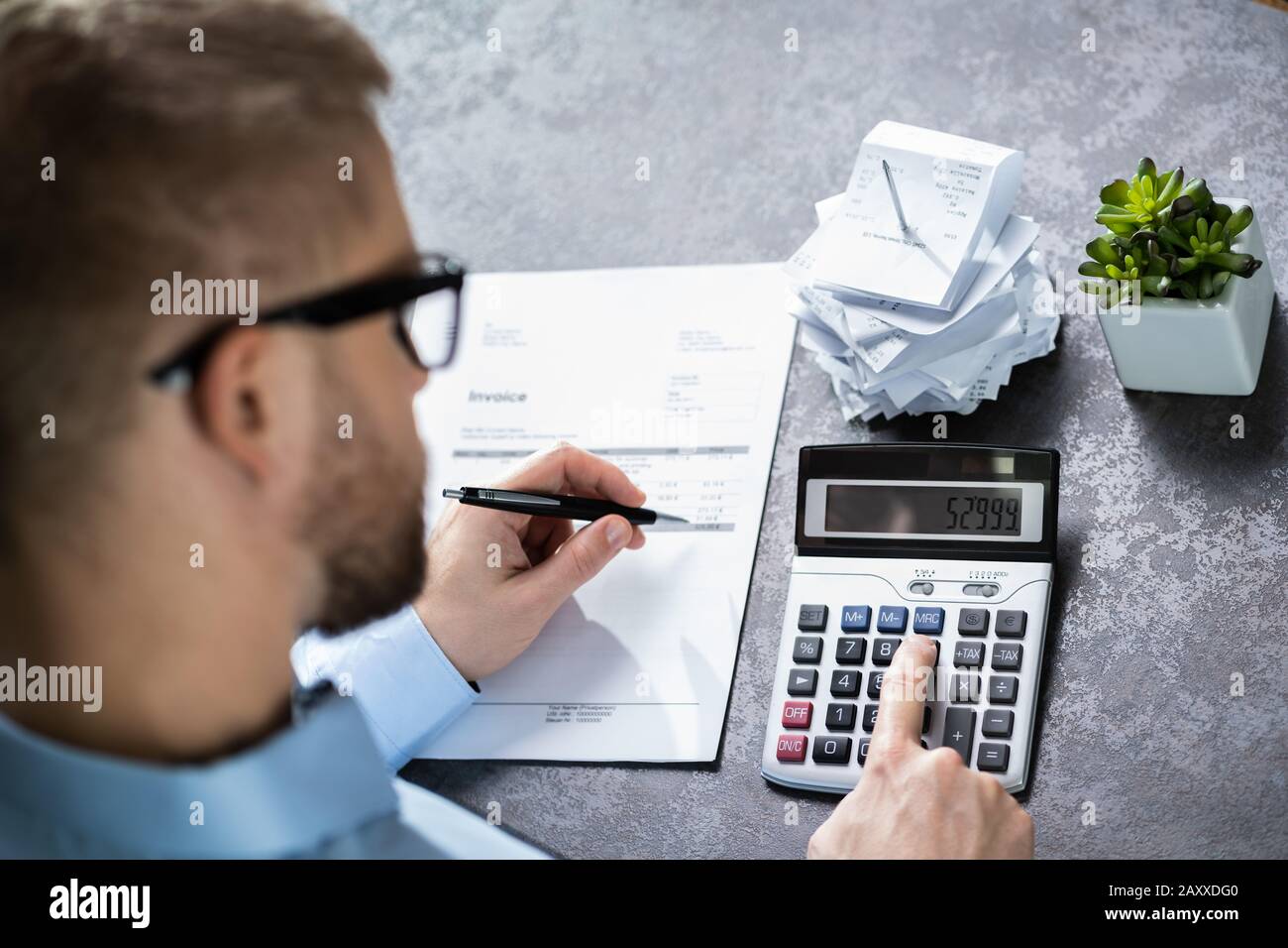 Accountant Calculating Finances. Over The Shoulder View Stock Photo - Alamy