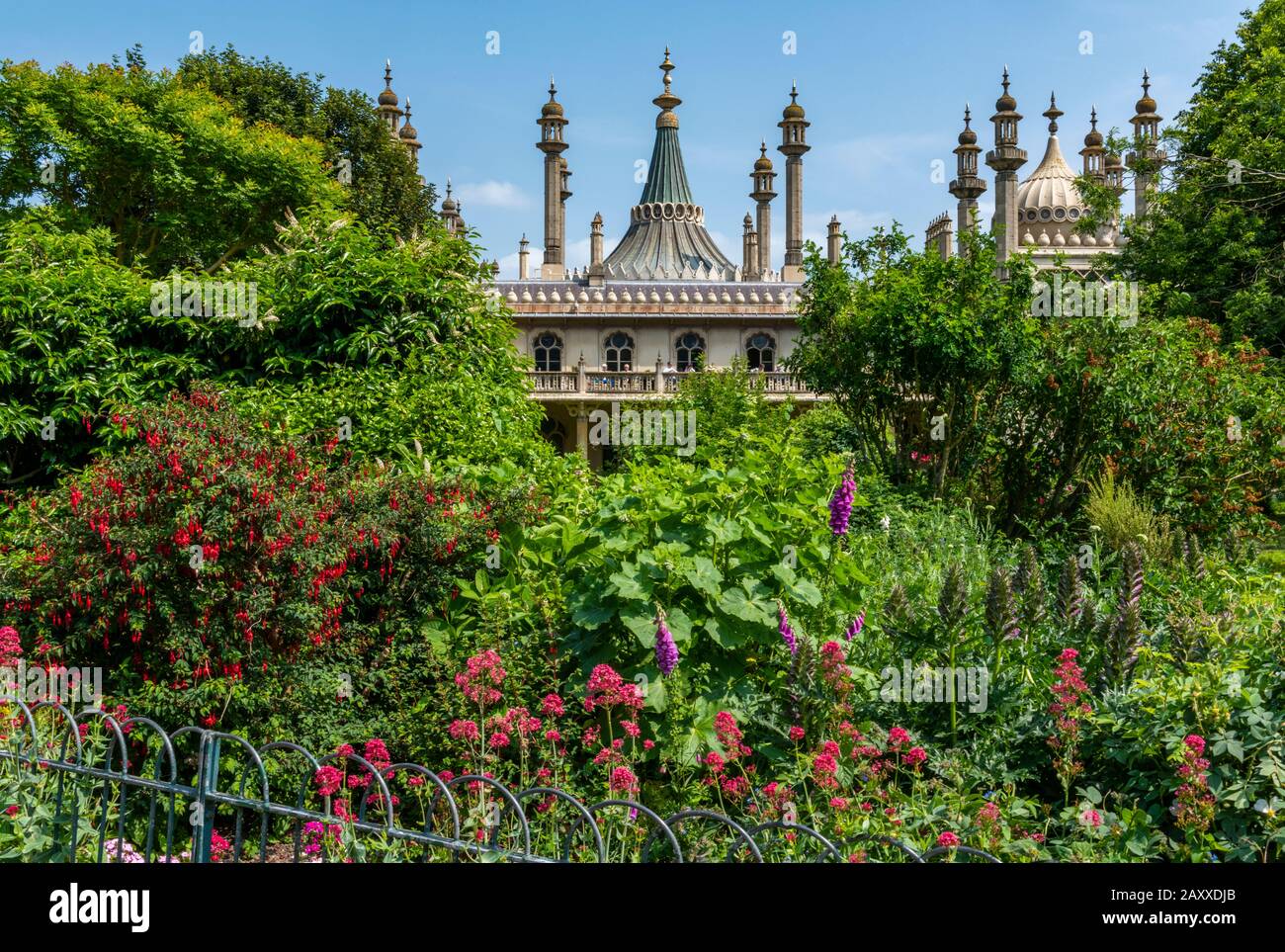 the pavillion at brighton hidden partially behind trees in the park ...