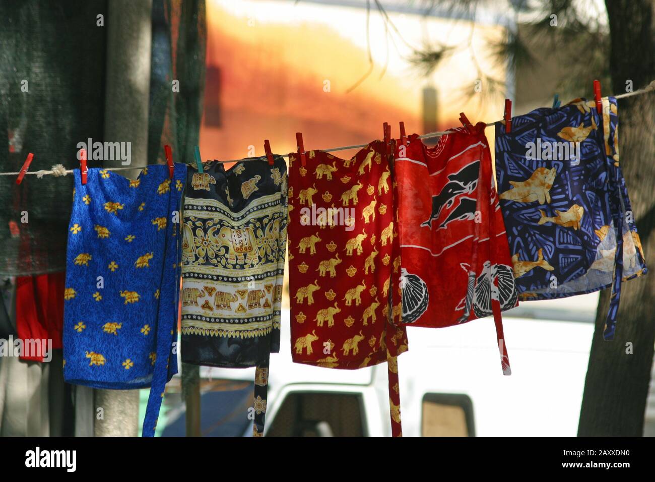 Colorful laundry drying on a string Stock Photo - Alamy