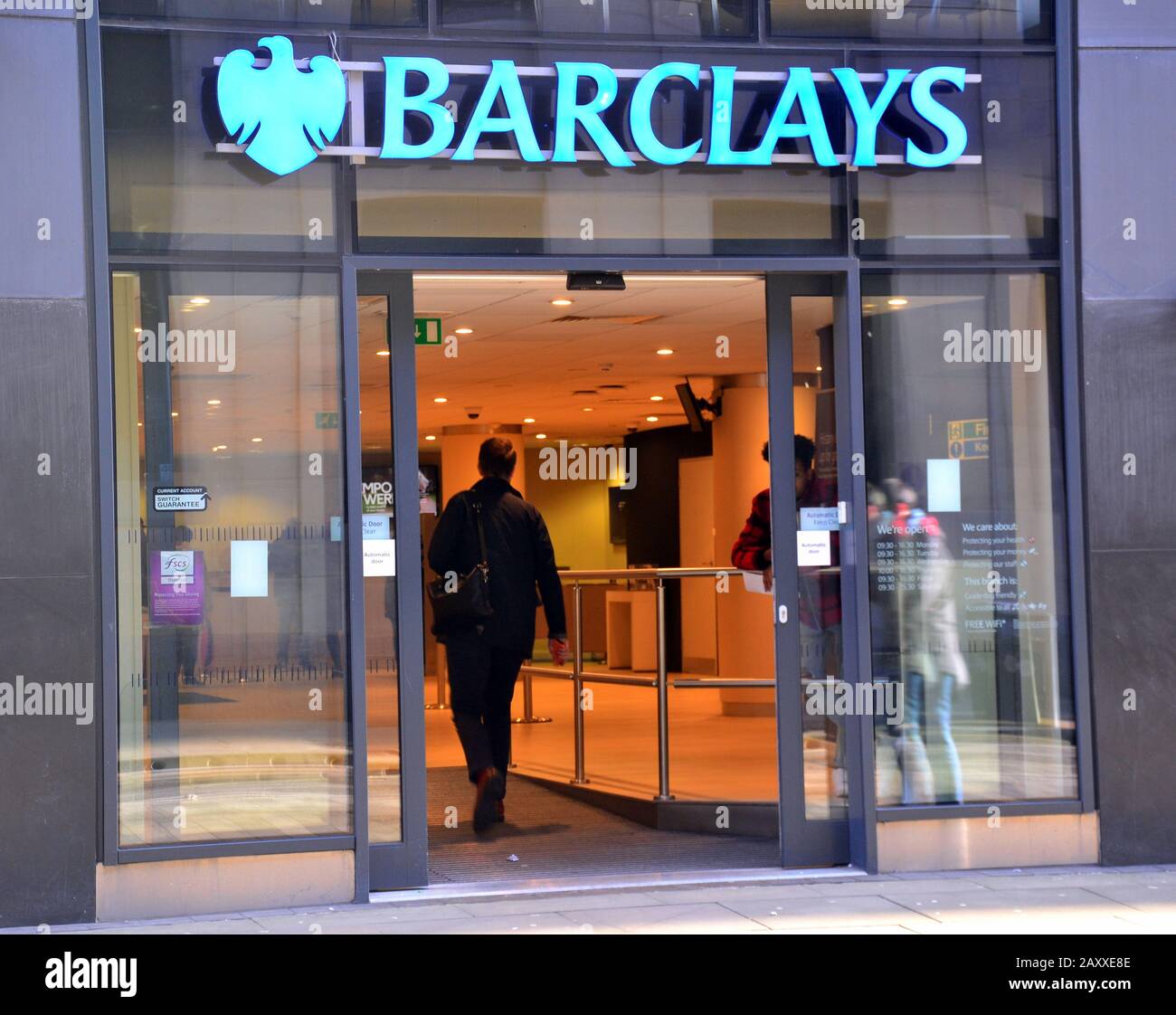 Man entering bank hi-res stock photography and images - Alamy