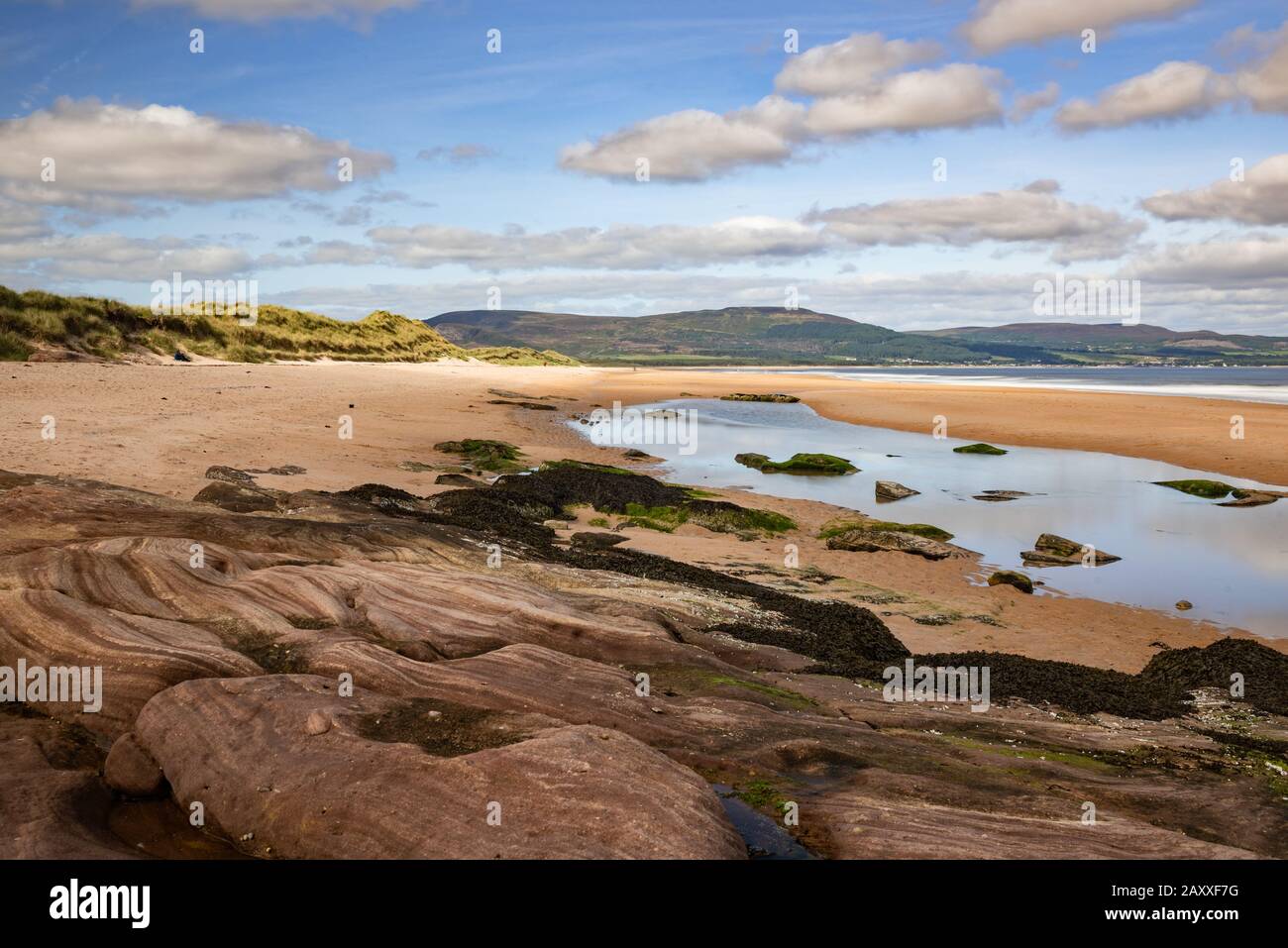 Golden sandy beach at Embo Stock Photo - Alamy