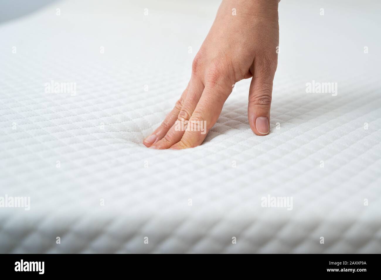 Hand Testing Orthopedic Memory Foam Core Mattress Stock Photo - Alamy