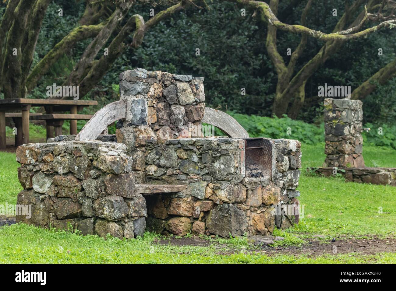 Huge stone barbecue for cooking meat, seafood during the holidays ...