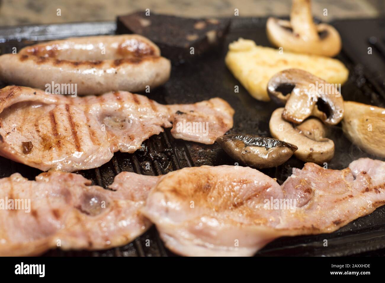 Bacon rashers and sausages hi-res stock photography and images - Alamy