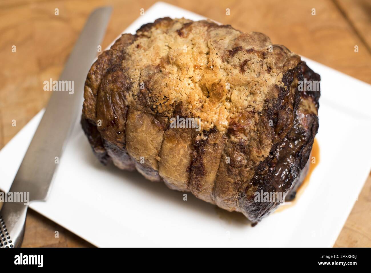 Overhead view of roast beef portion tied with string and sitting on ...