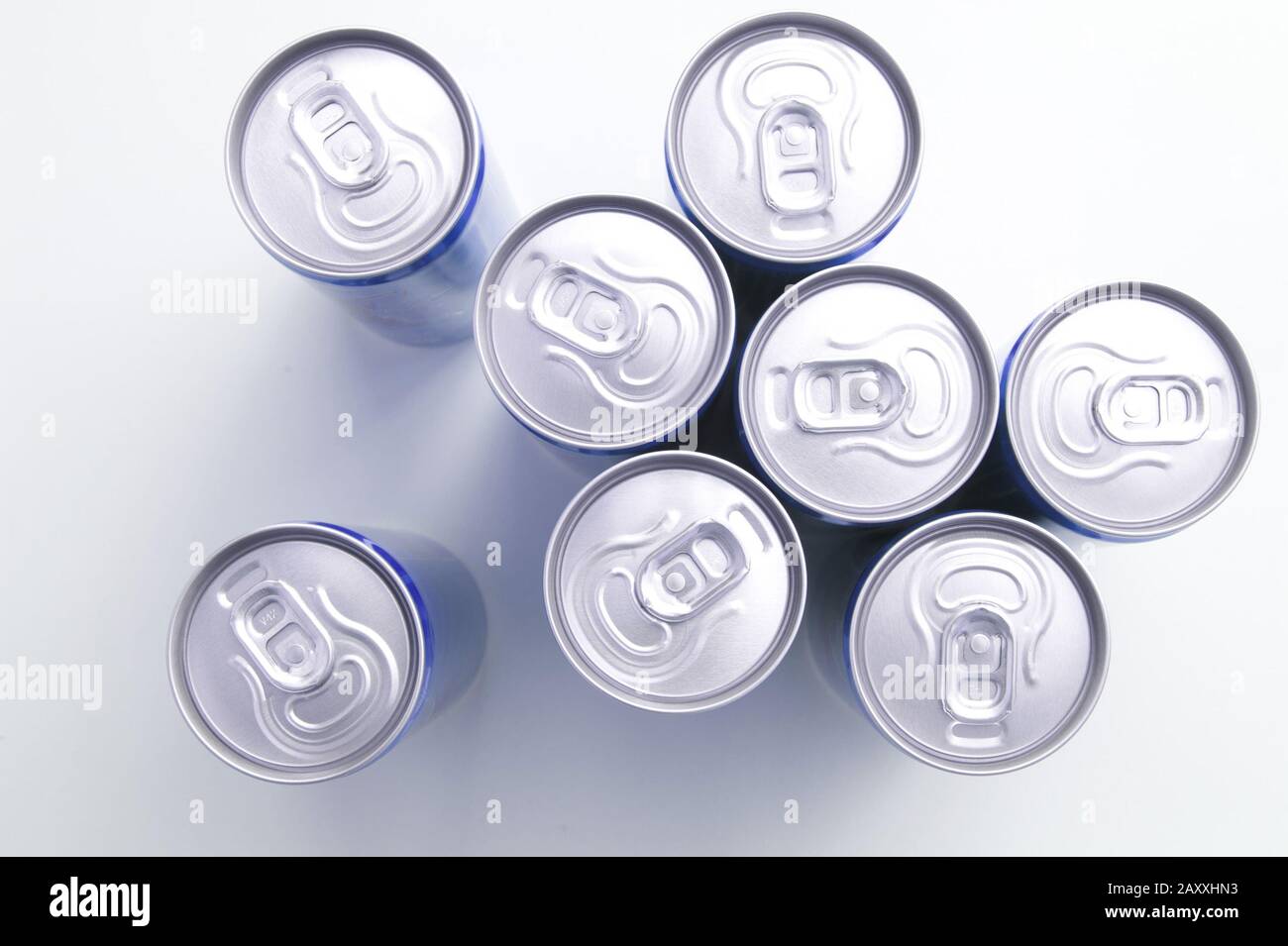 Unopened drinks cans viewed from above looking down onto the aluminium ...
