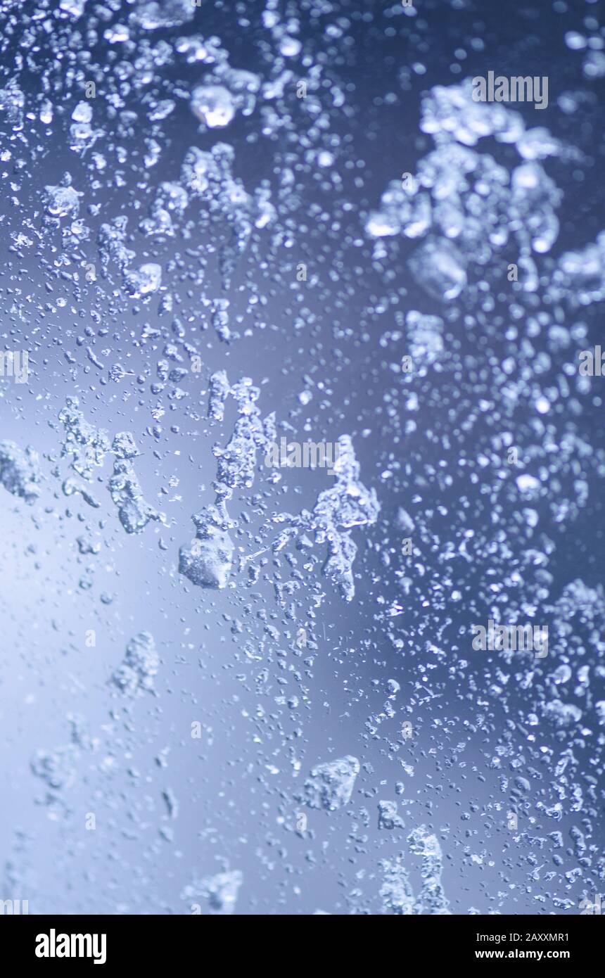 Winter frozen window glass. Texture frozen window glass. Blue frozen ...