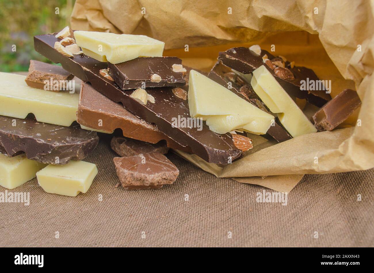 Chocolate mix on rustic wooden background. Chocolate bar pieces Stock ...