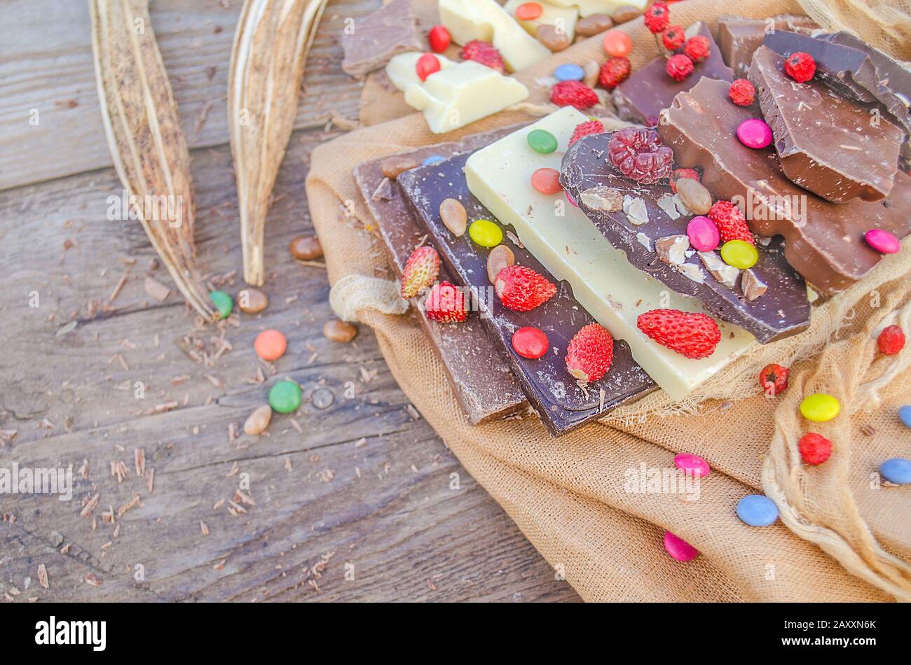 Chocolate blocks stack with different kind of chocolate Stock Photo - Alamy