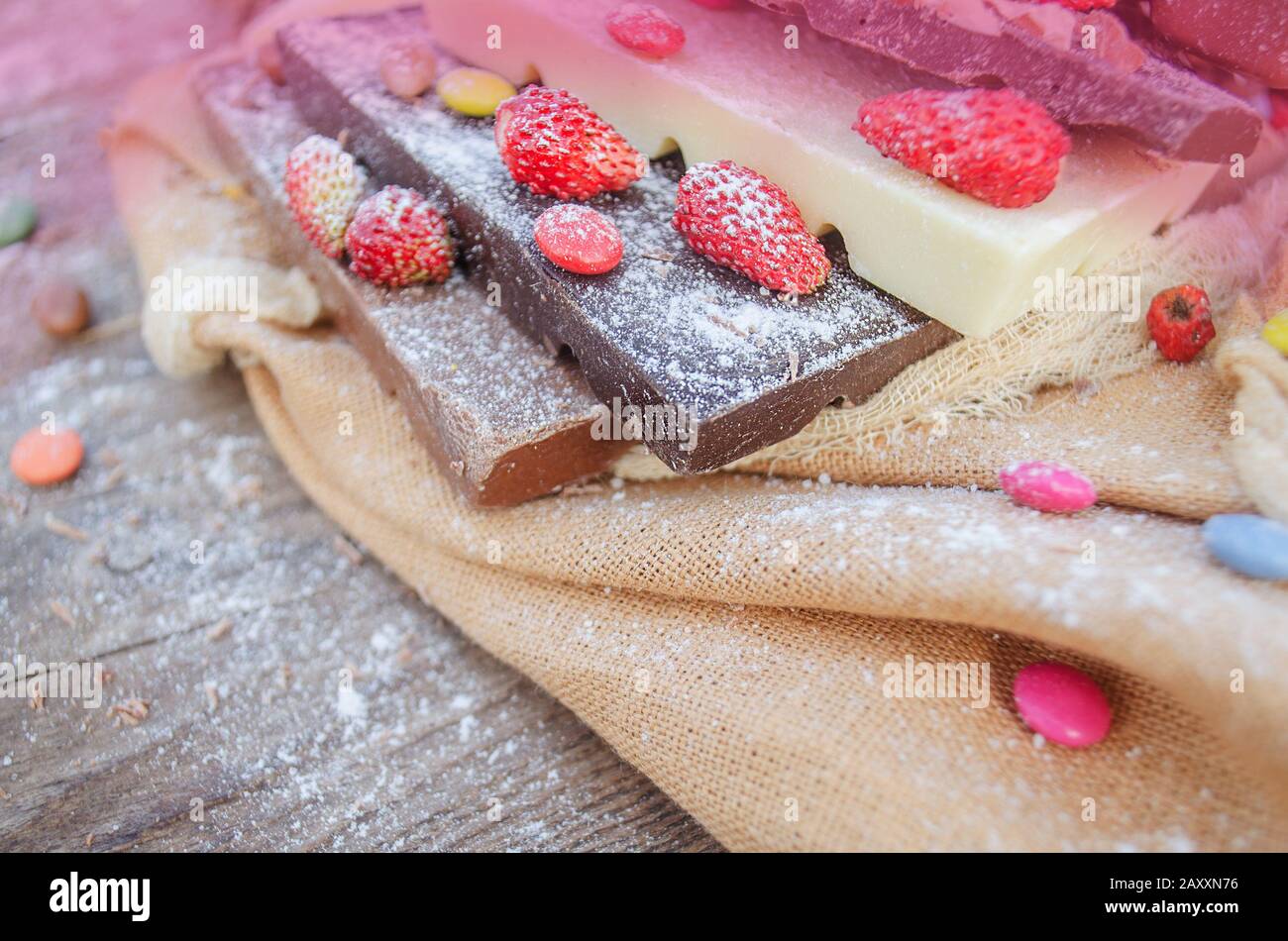 Chocolate blocks stack with different kind of chocolate Stock Photo - Alamy