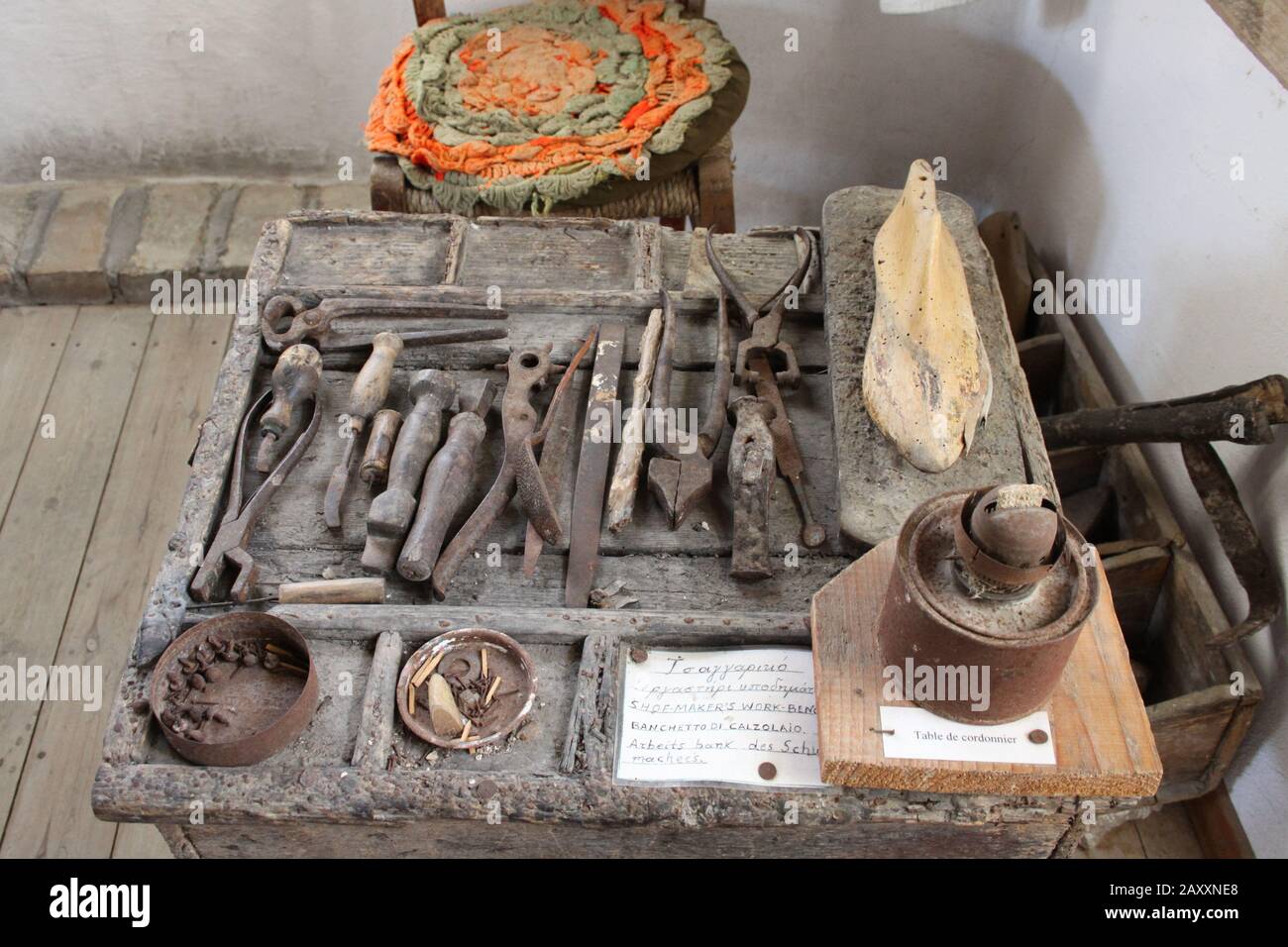Old tools of a shoemaker on Corfu, Greece Stock Photo - Alamy