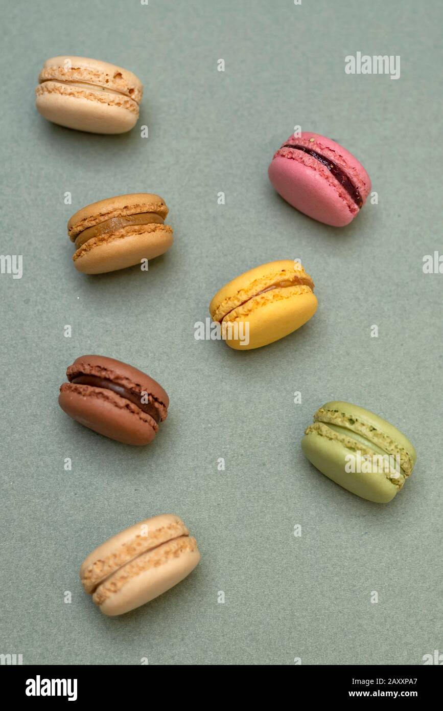 Above view of colorful macaroons on a marble countertop Stock Photo - Alamy