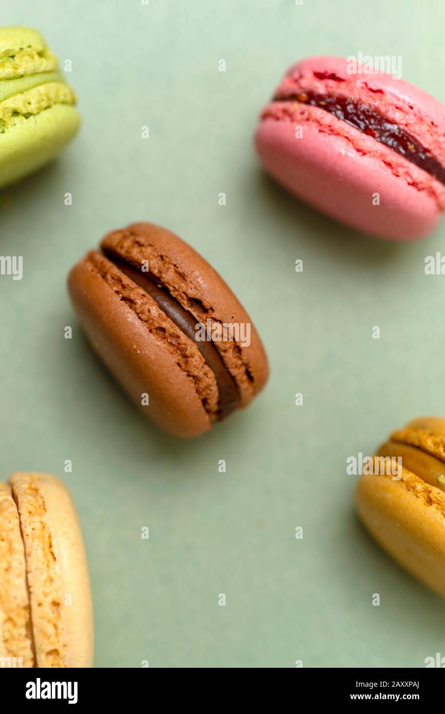 Above view of colorful macaroons on a marble countertop Stock Photo - Alamy