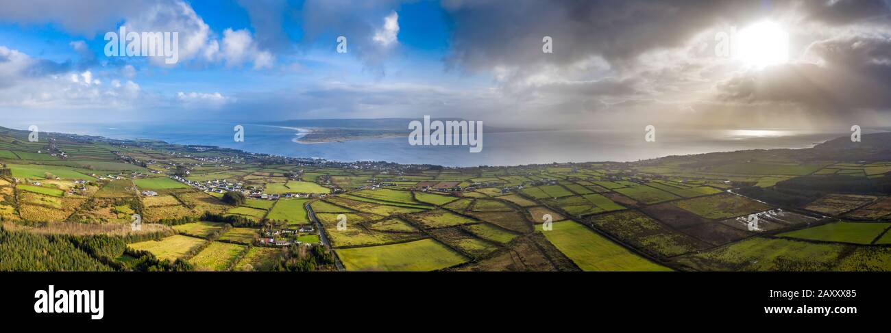 Aerial view of Greencastle, Lough Foyle and Magilligan Point in ...