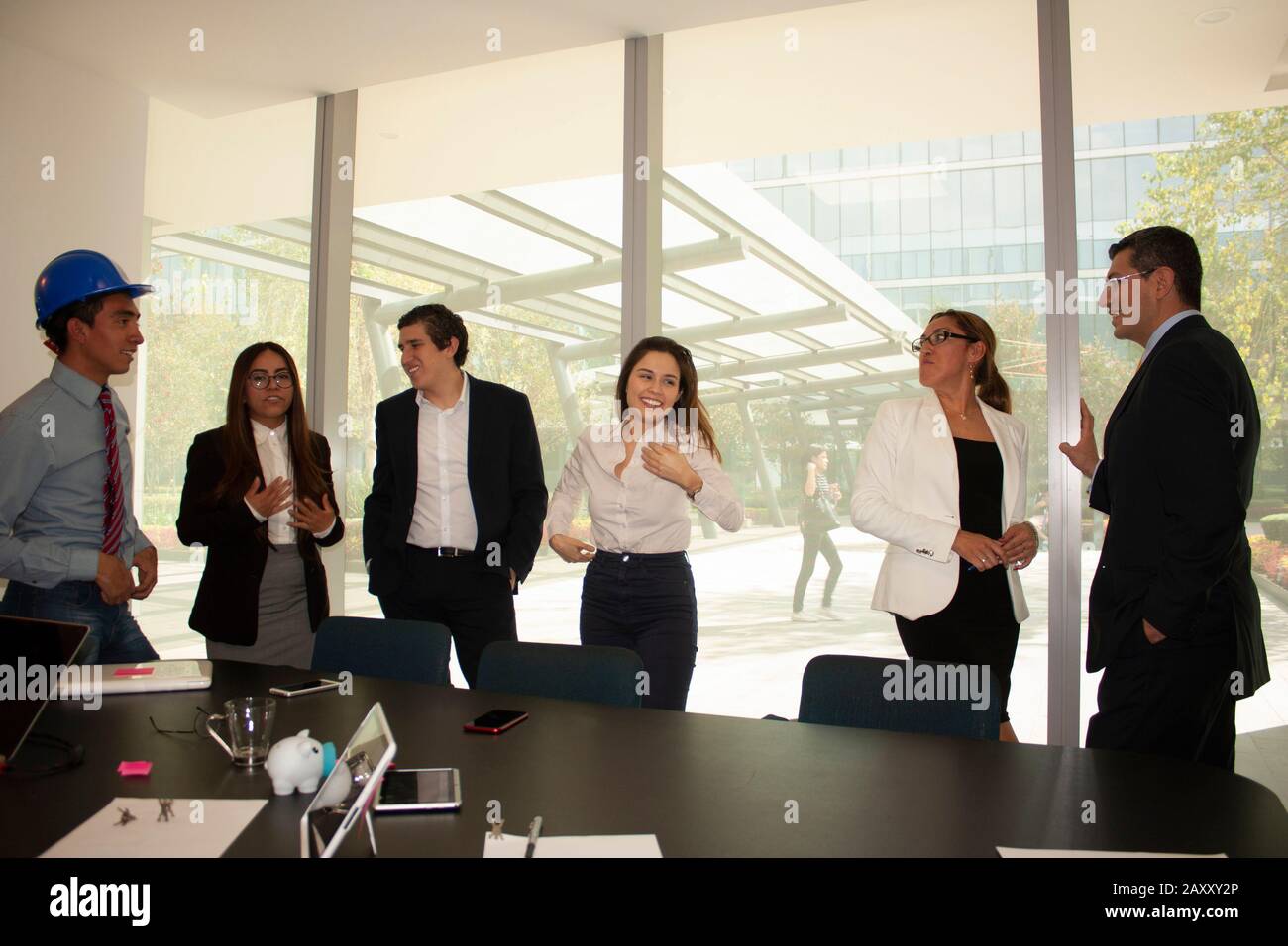 Office workers relaxing a few minutes in the office before continuing ...