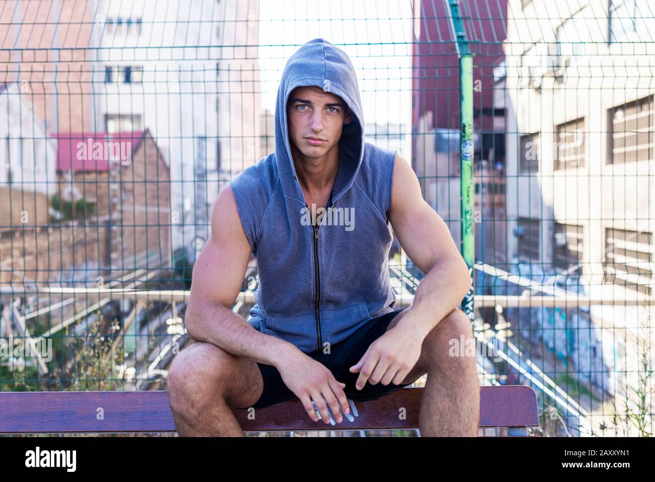 Muscular handsome athletic bodybuilder fitness model posing after ...