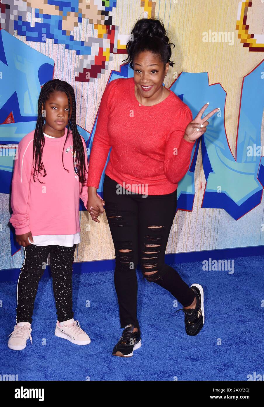 WESTWOOD, CA - FEBRUARY 12: Tiffany Haddish and her god daughter ...