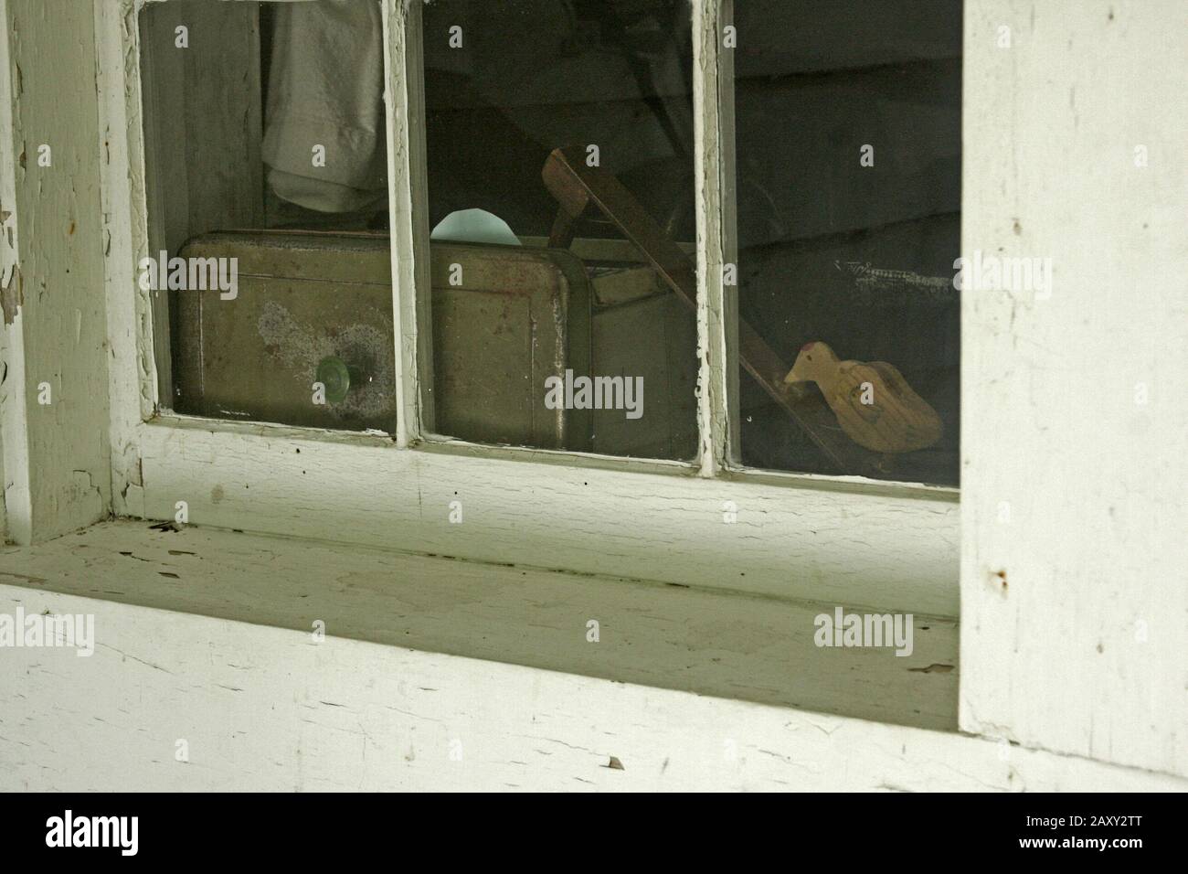 Vintage objects seen through window of an old house. Virginia, USA ...