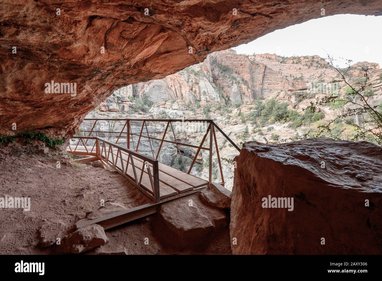Old Bridge To Canyon Overlook hangs along side of mountain Stock Photo ...
