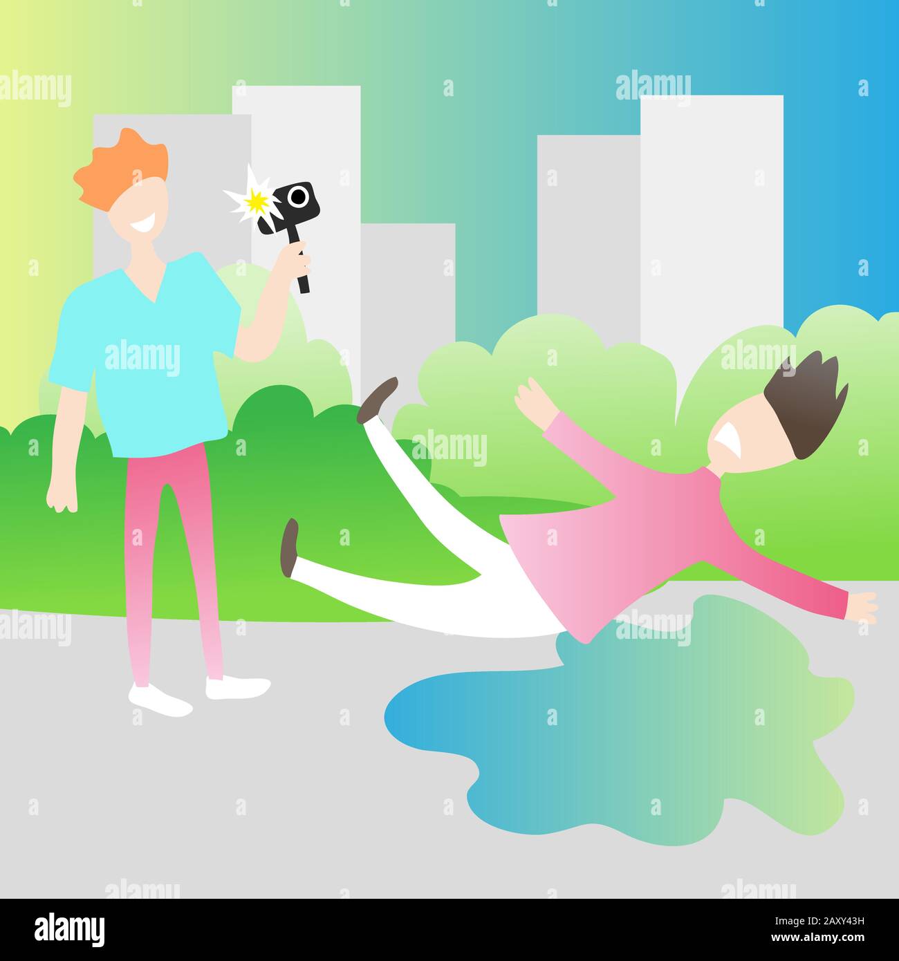 Man makes video as a man falls into puddle in the park. Prank media ...