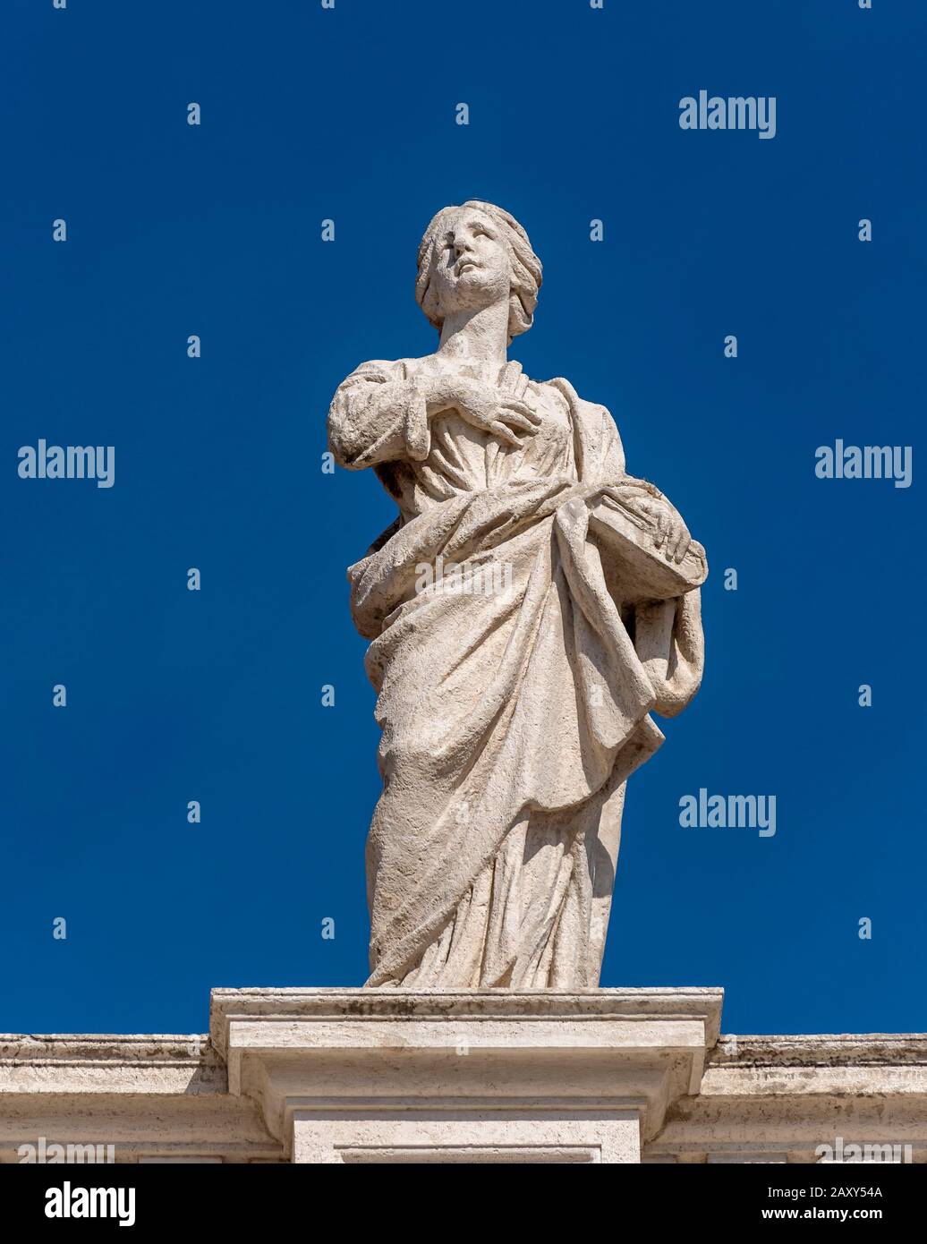 Statue of St. Macrina on Bernini colonnades, St. Peter's Square ...