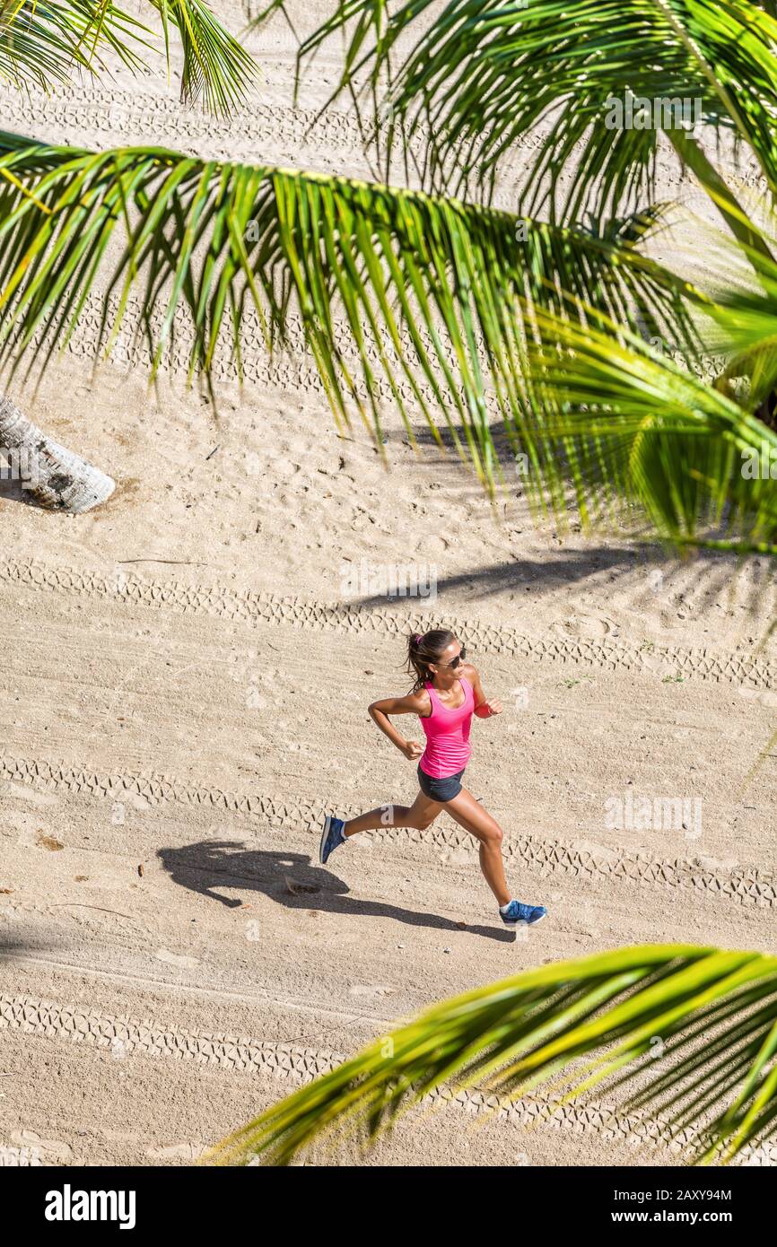 Healthy active life sport woman running training cardio on tropical ...