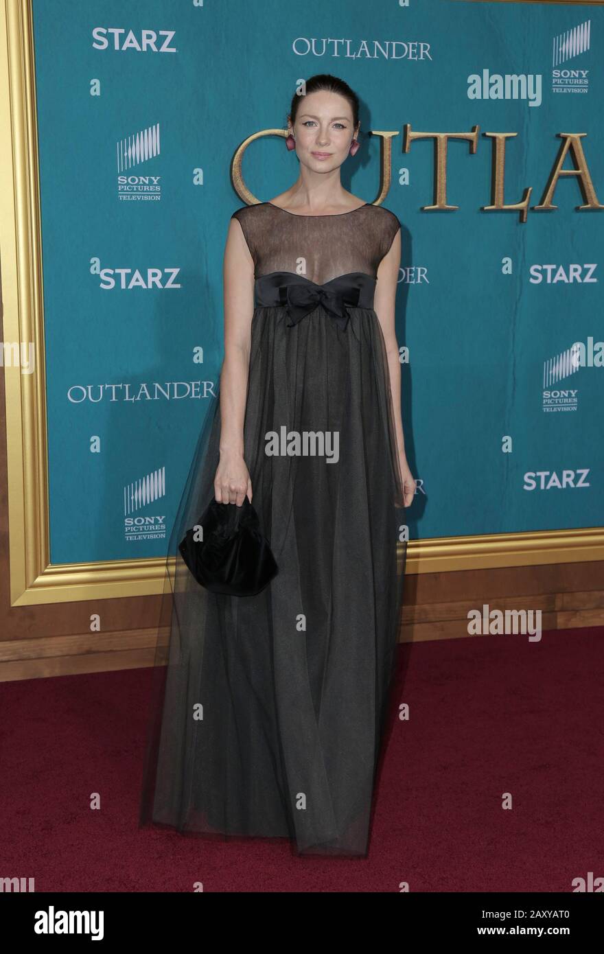Caitriona Balfe walking the red carpet at the Starz Premiere Event For ...