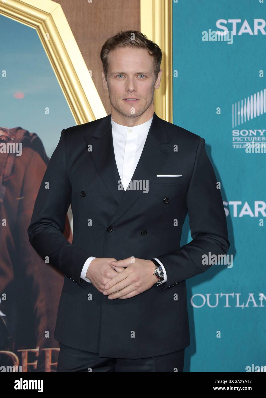 Sam Heughan walking the red carpet at the Starz Premiere Event For ...