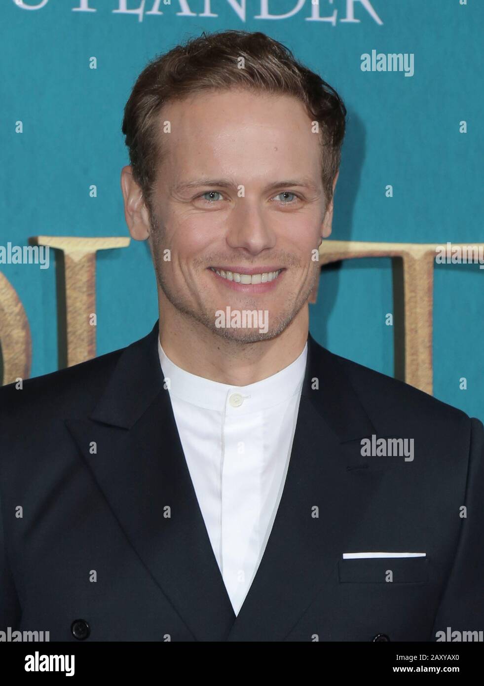 Sam Heughan walking the red carpet at the Starz Premiere Event For ...