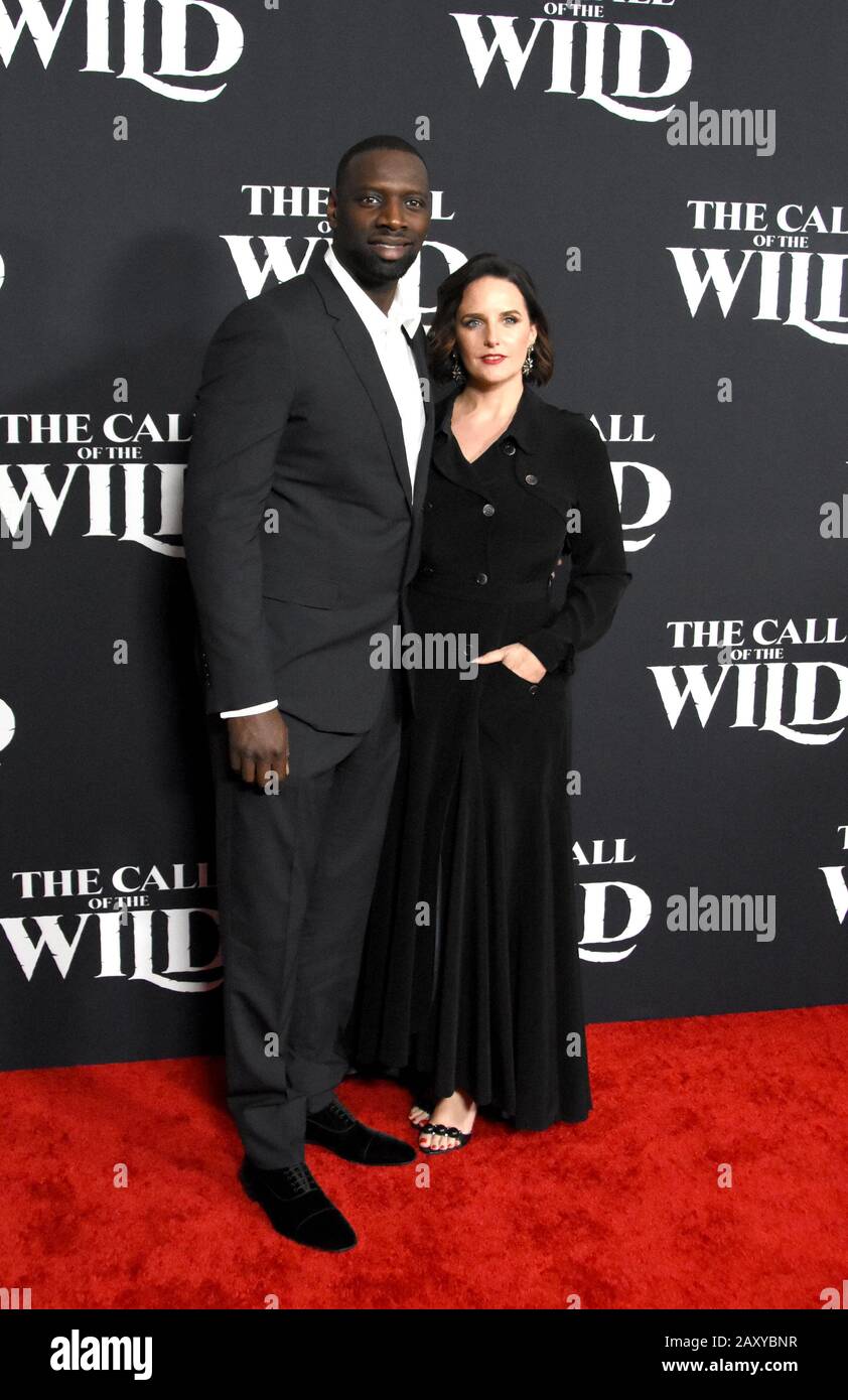 Hollywood, California, USA 13th February 2020 Actor Omar Sy and wife ...