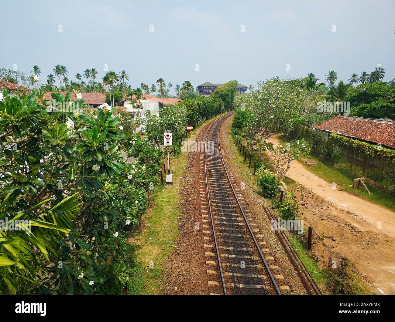 Railway track near residential buildings Stock Photo - Alamy