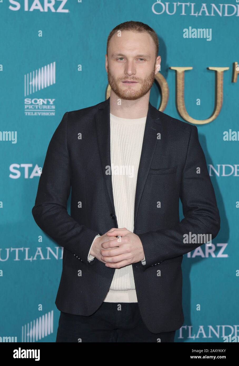 Hollywood, USA. 13th Feb, 2020. Yan Tual walking the red carpet at the ...